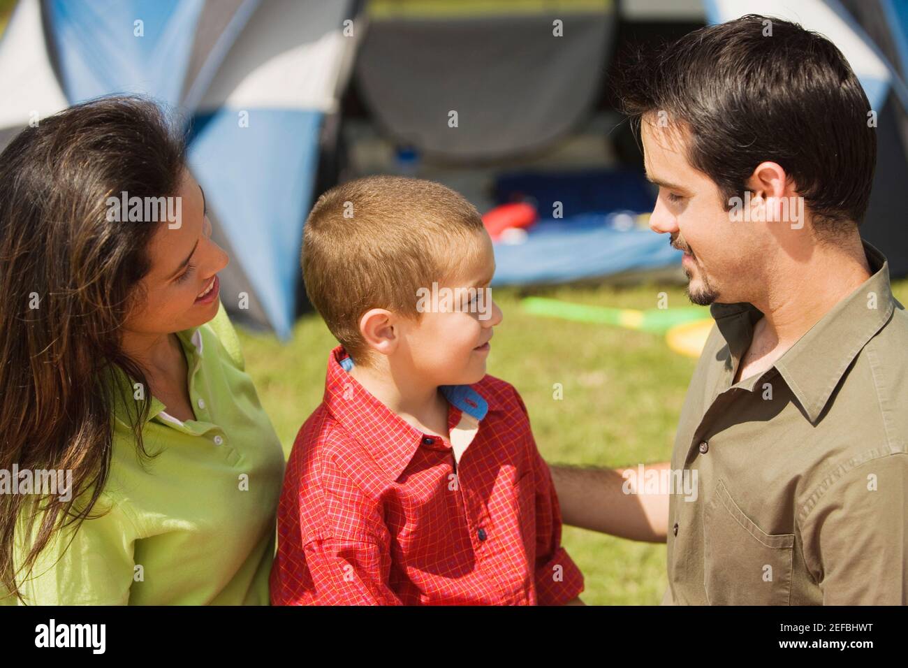 Side profile of parents and their son Stock Photo - Alamy