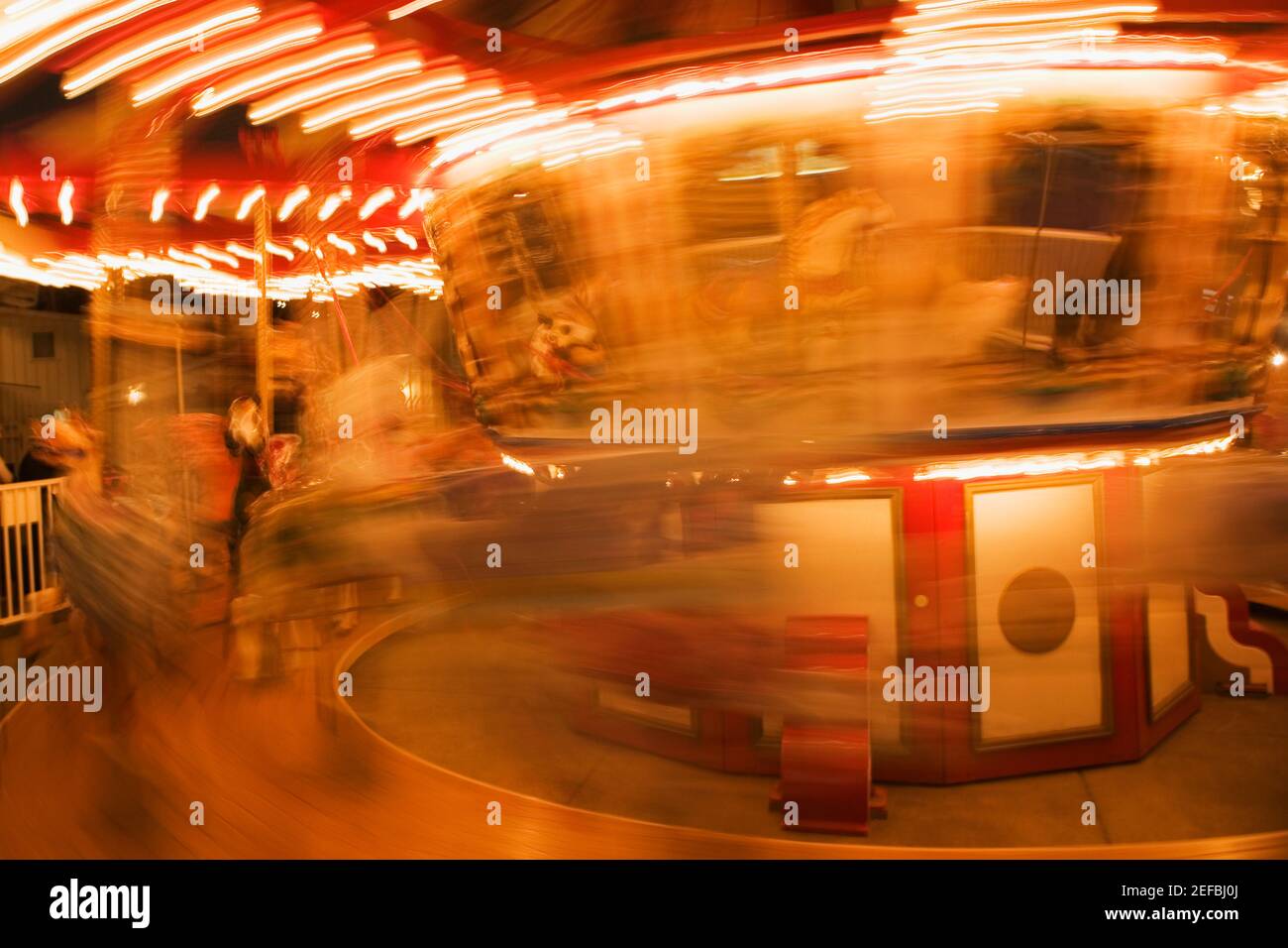 Close-up of a carousel at night Stock Photo - Alamy