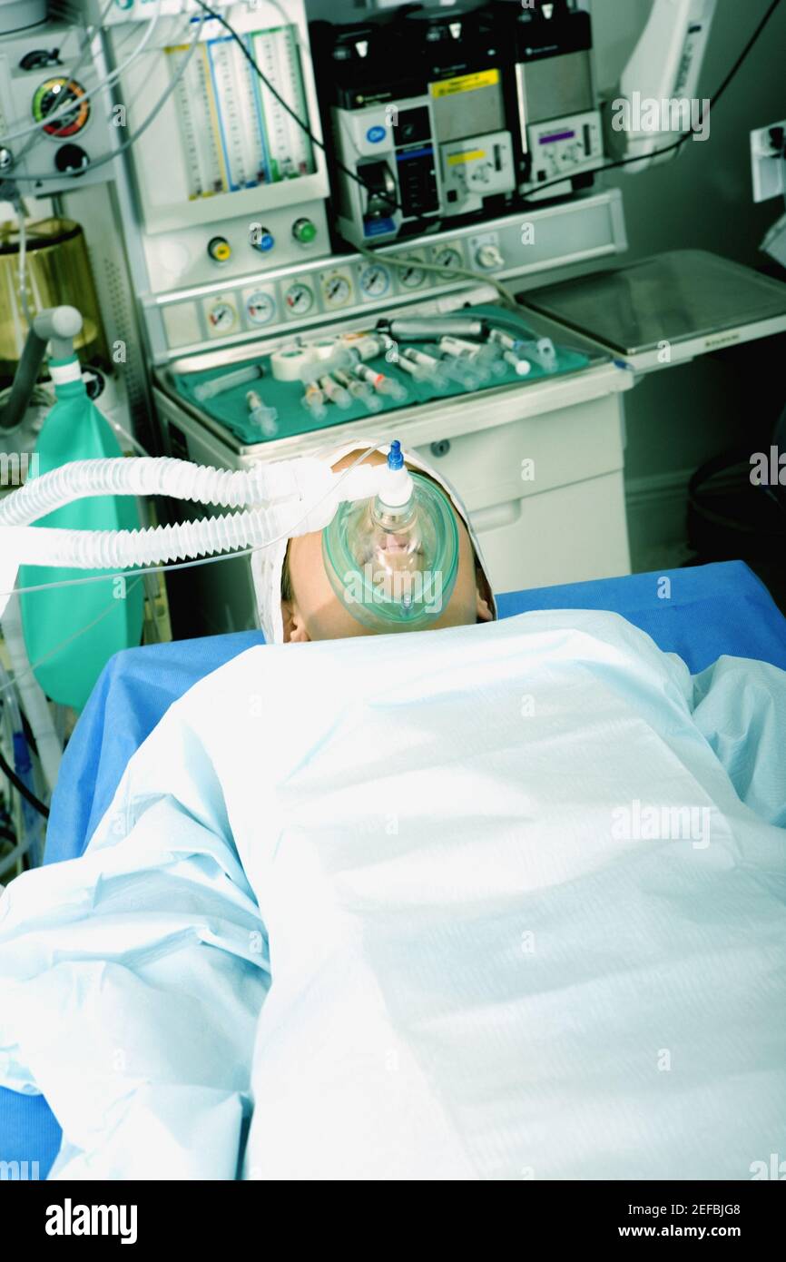 Patient lying on an operating table hi-res stock photography and images ...