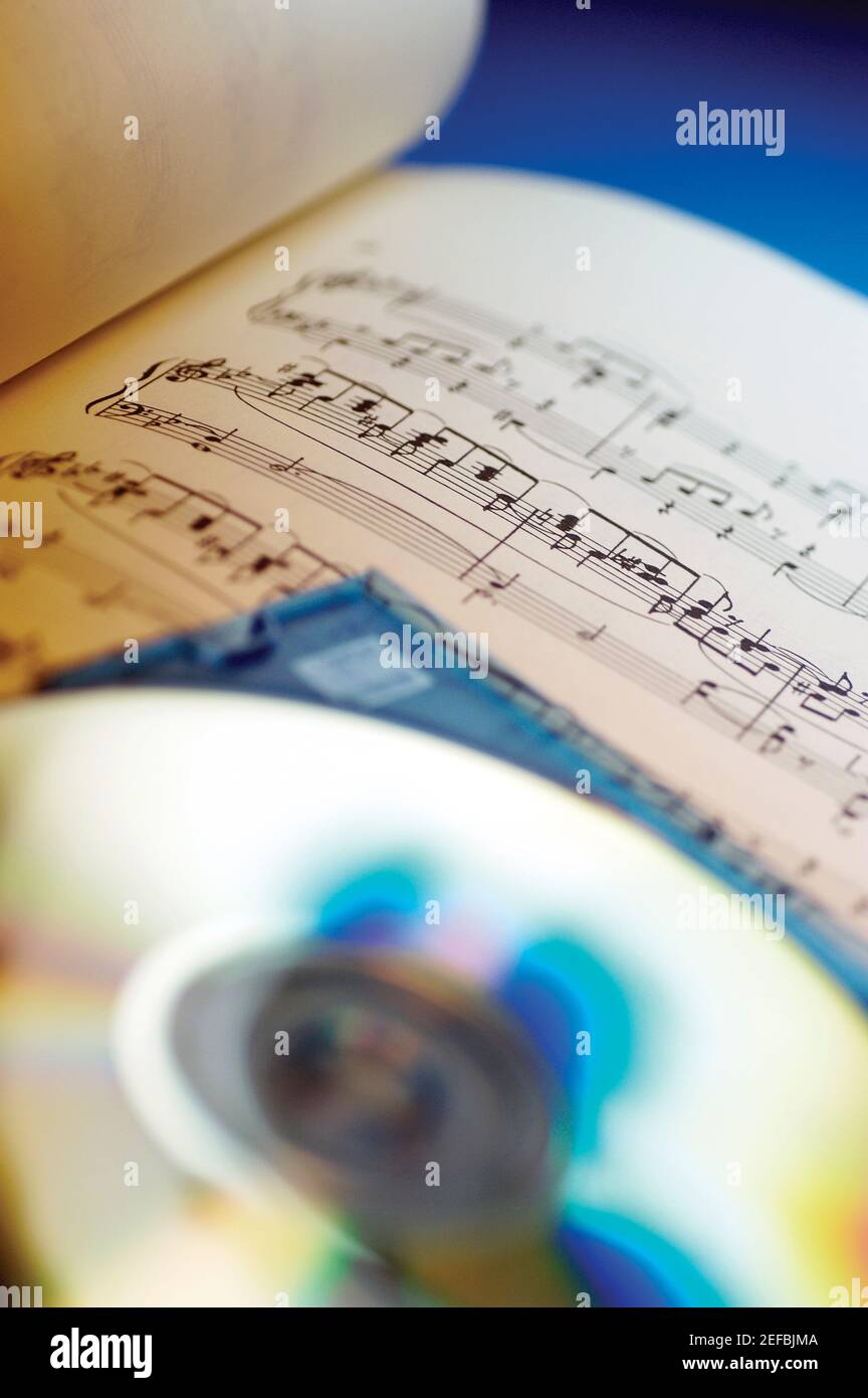 Close-up of CD and sheet music Stock Photo - Alamy