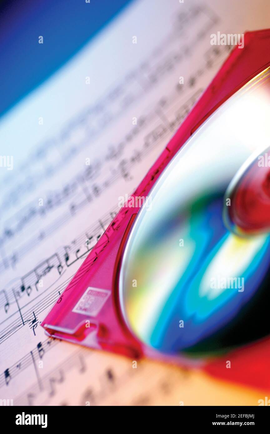 Close-up of CD and sheet music Stock Photo - Alamy
