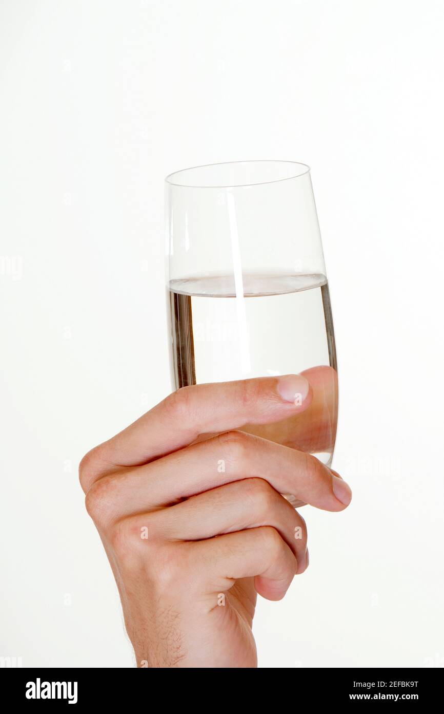 Hand holding shot glass hi-res stock photography and images - Alamy