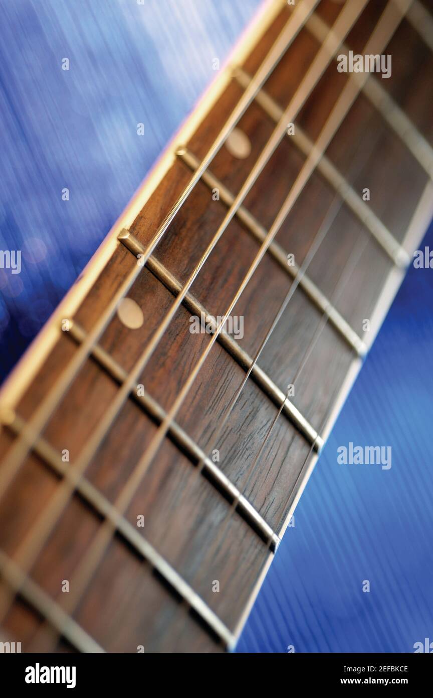 Close-up of handle and strings of electric guitar Stock Photo - Alamy