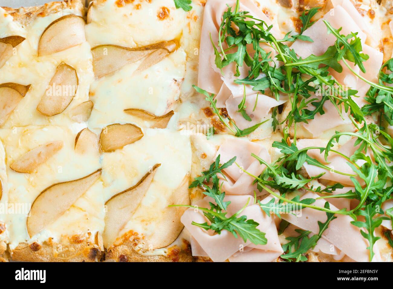 Pinsa romana with pear, cheese, prosciutto in delivery box ...