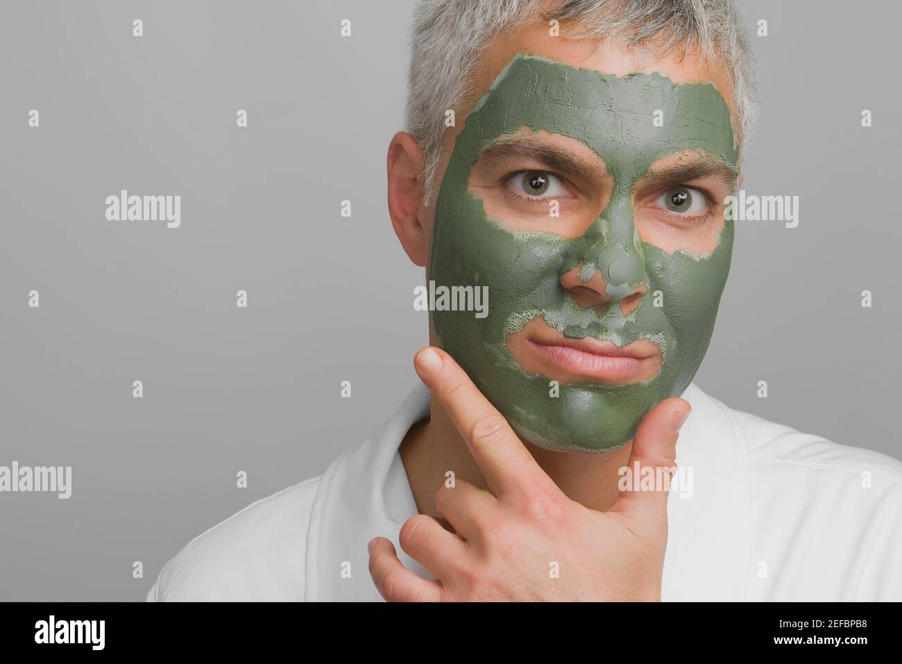 Man wearing facial covering hi-res stock photography and images - Alamy