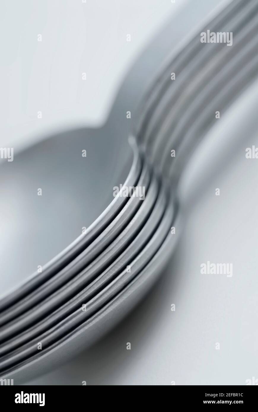 Stack of spoons hi-res stock photography and images - Alamy
