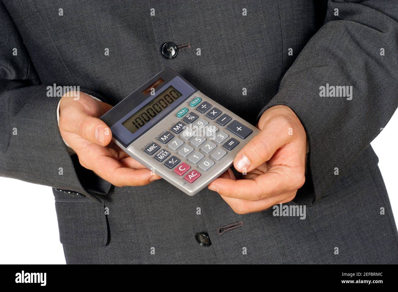 Businessman holding calculator hi-res stock photography and images - Alamy