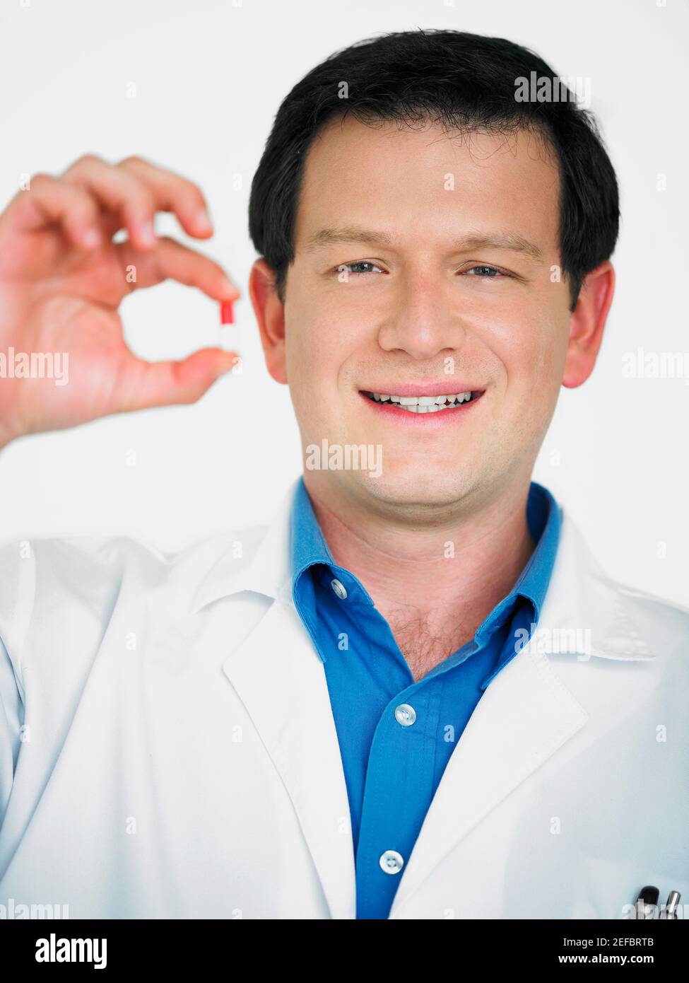 Doctor holding head looking down hi-res stock photography and images ...