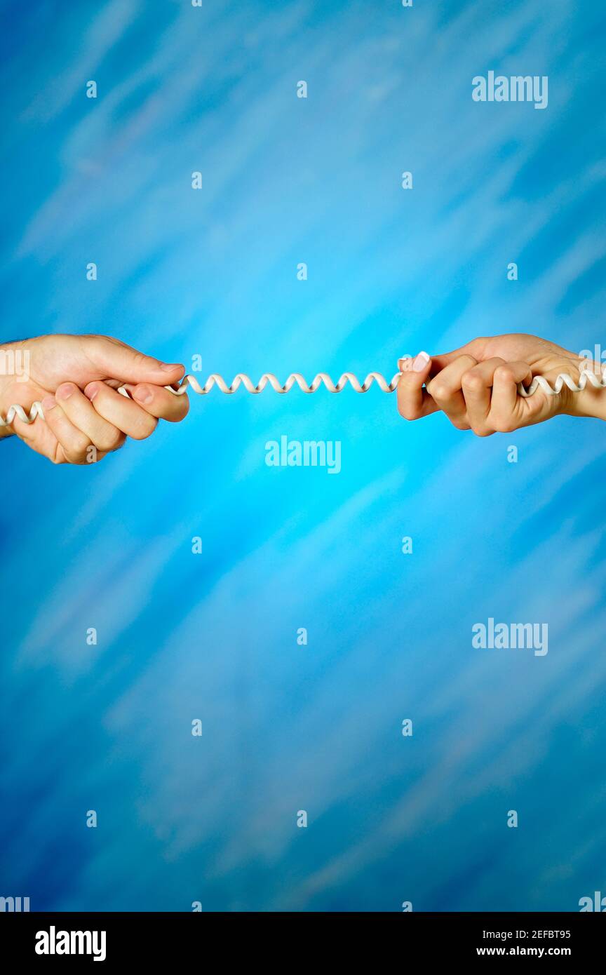 Human hand holding telephone cord hi-res stock photography and images ...