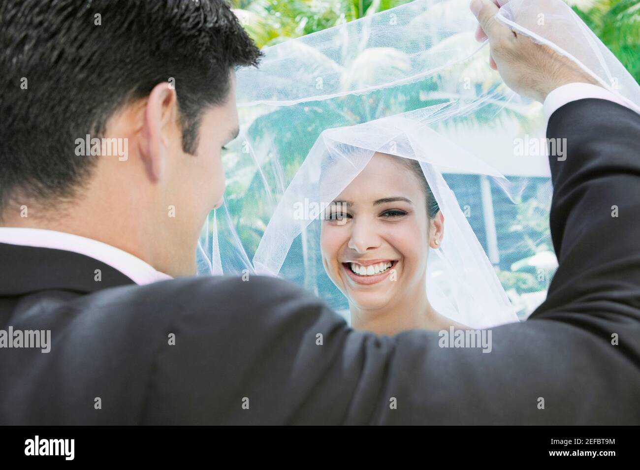 Groom Lifting Veil Bride High Resolution Stock Photography and Images ...