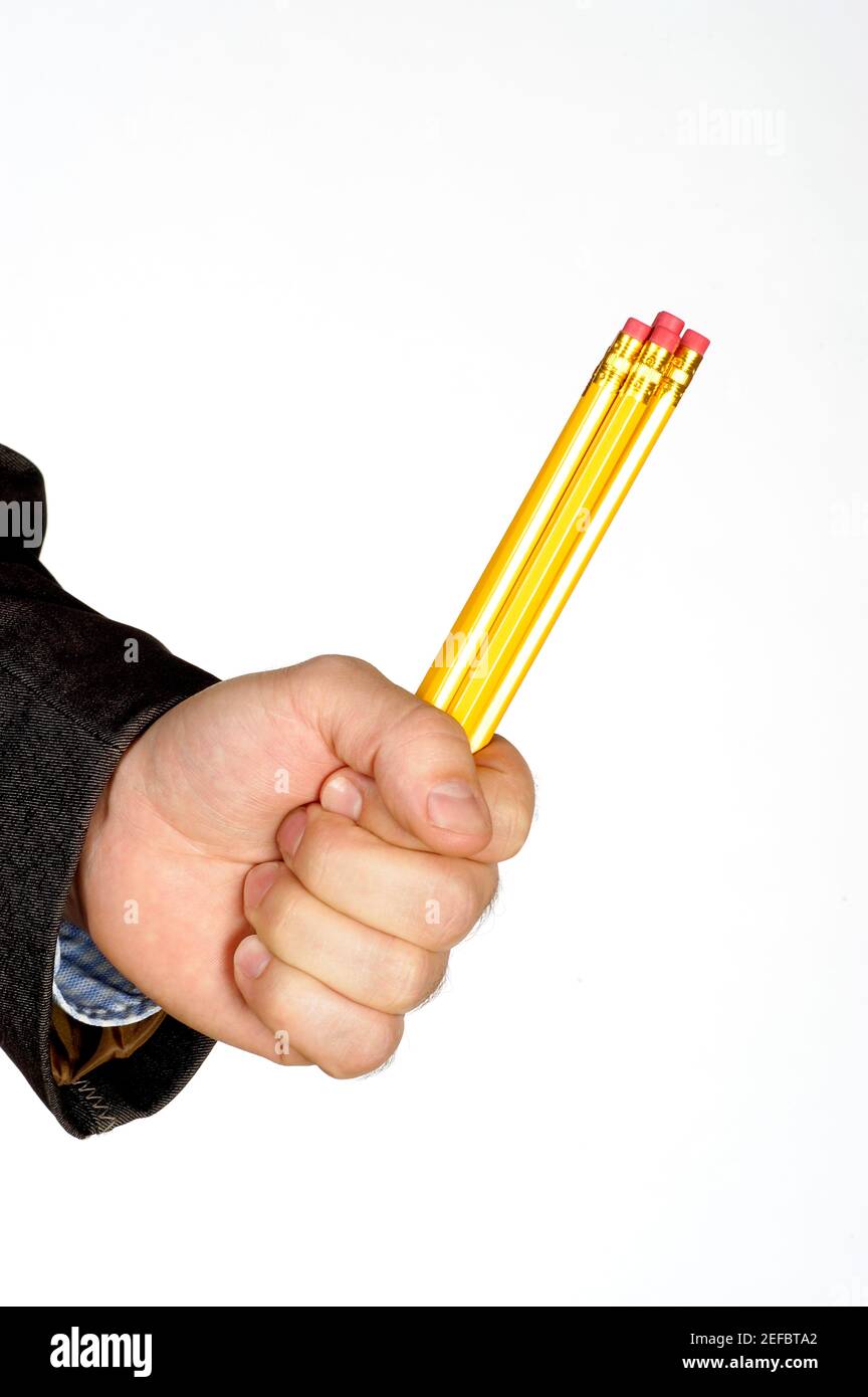 Hand Holding Pencil Up