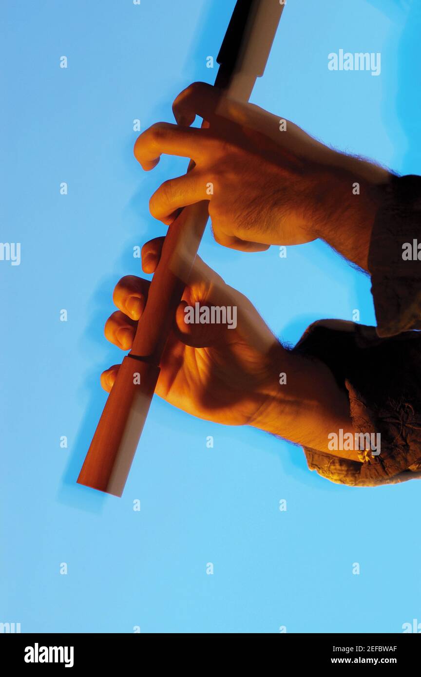 Hands holding flute hi-res stock photography and images - Alamy