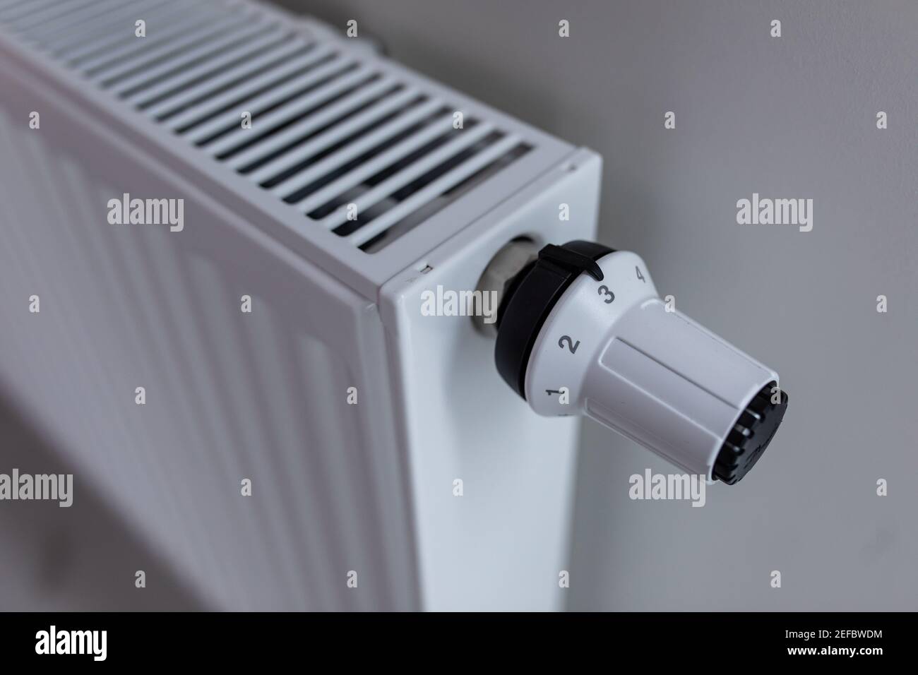 Heating white radiator radiator in living room Stock Photo - Alamy