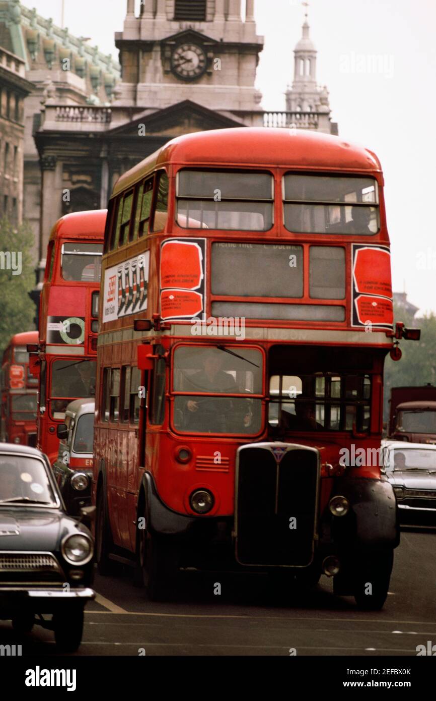 A double decker bus on a busy street, London, England Stock Photo - Alamy
