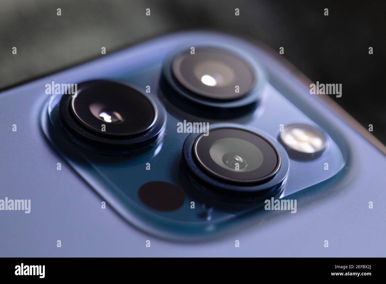Close up photo of modern smartphone's triple-lens camera Stock Photo ...
