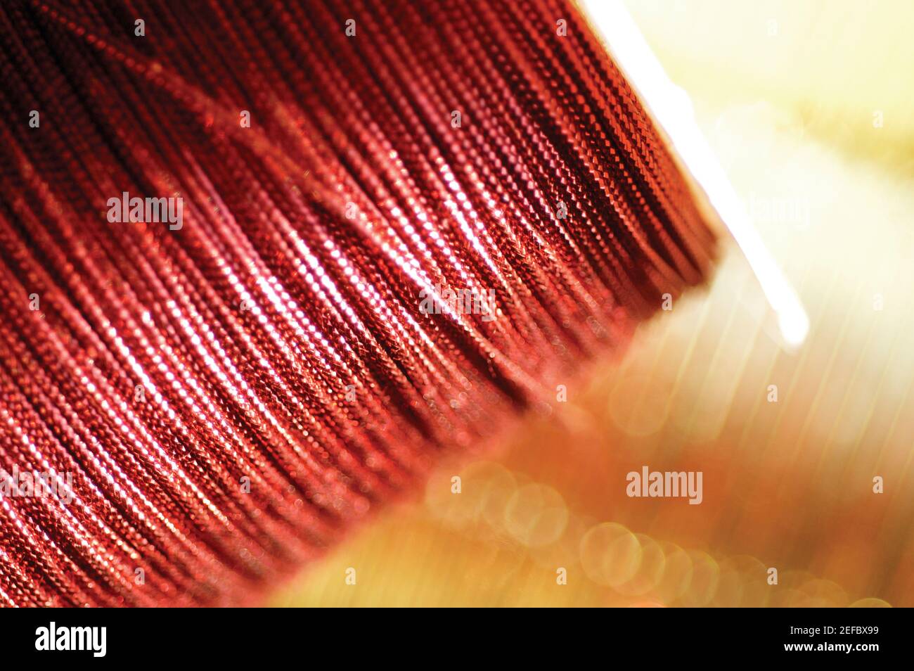 Close-up of a spool of a decorative string Stock Photo - Alamy