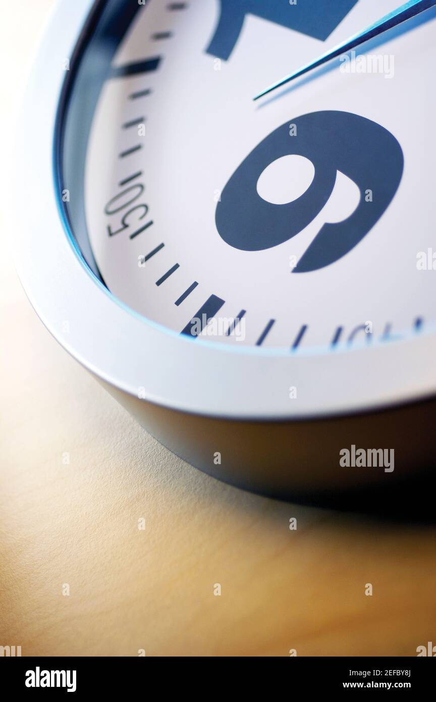 Close-up of number nine on a clock Stock Photo - Alamy
