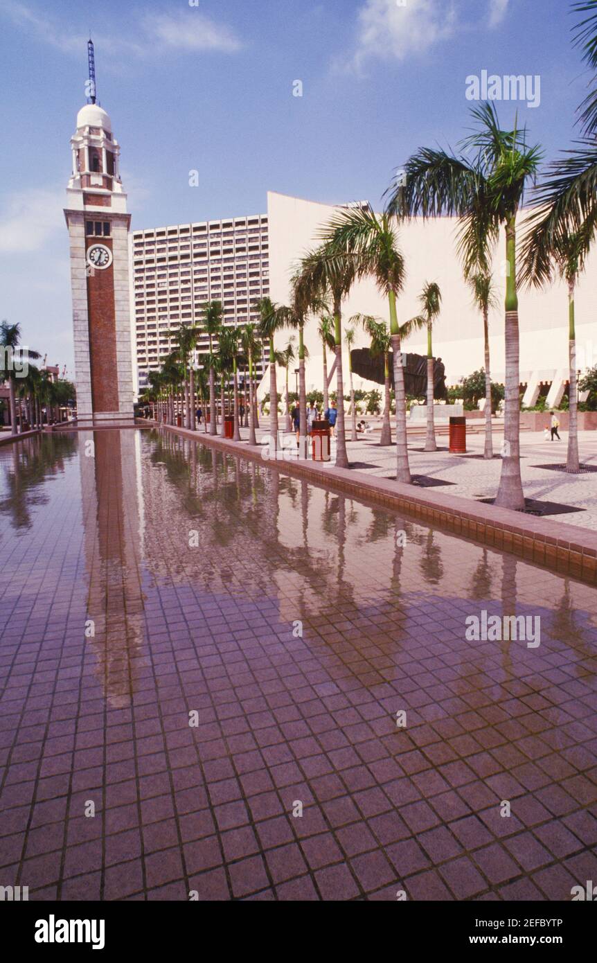 Clock tower in front of a building, Hong Kong, China Stock Photo - Alamy