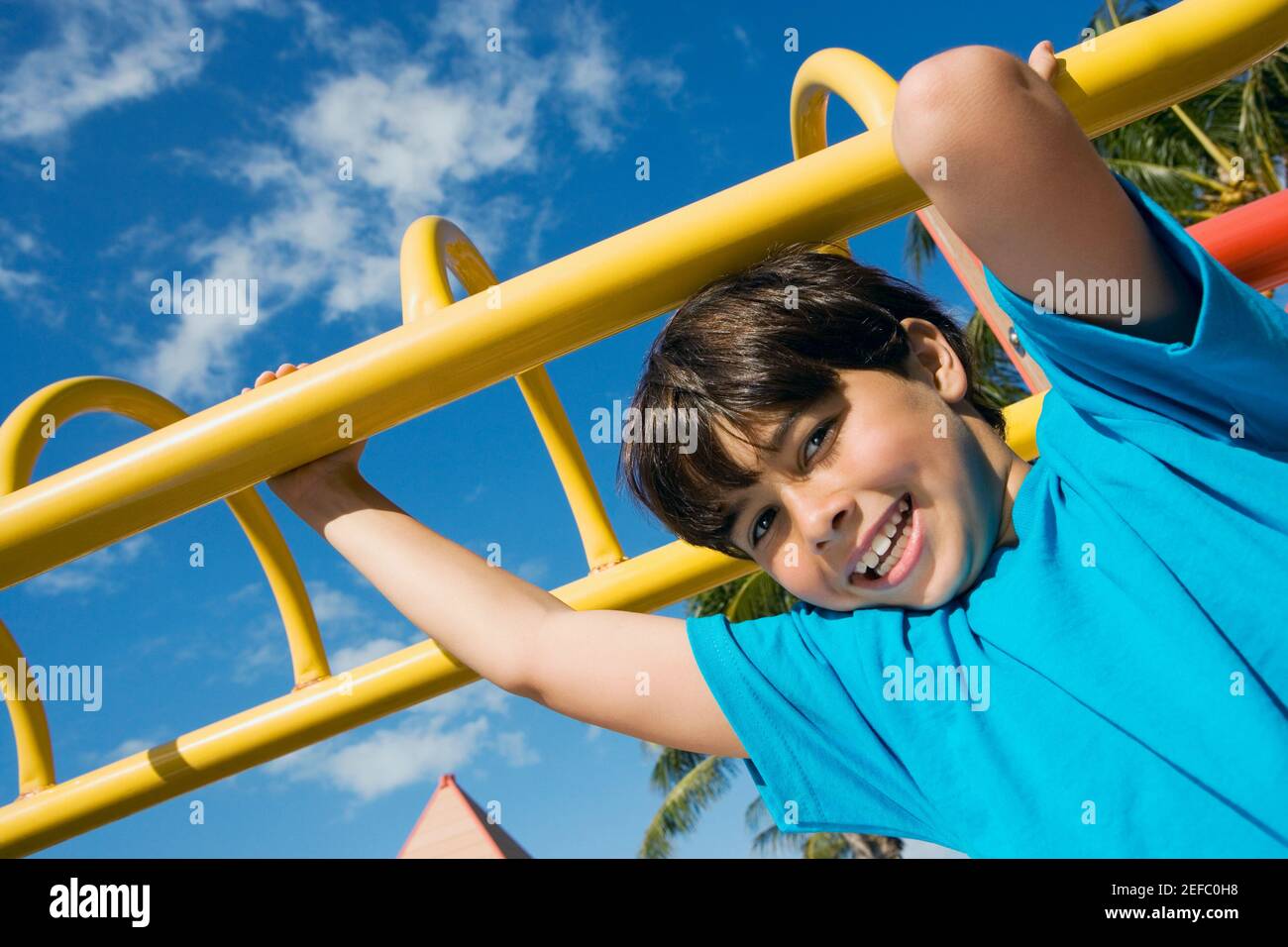 Child Hanging From Bars High Resolution Stock Photography and Images ...