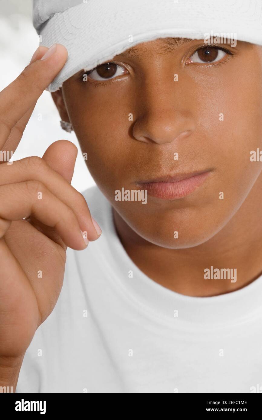 Portrait of a teenage boy looking serious Stock Photo - Alamy