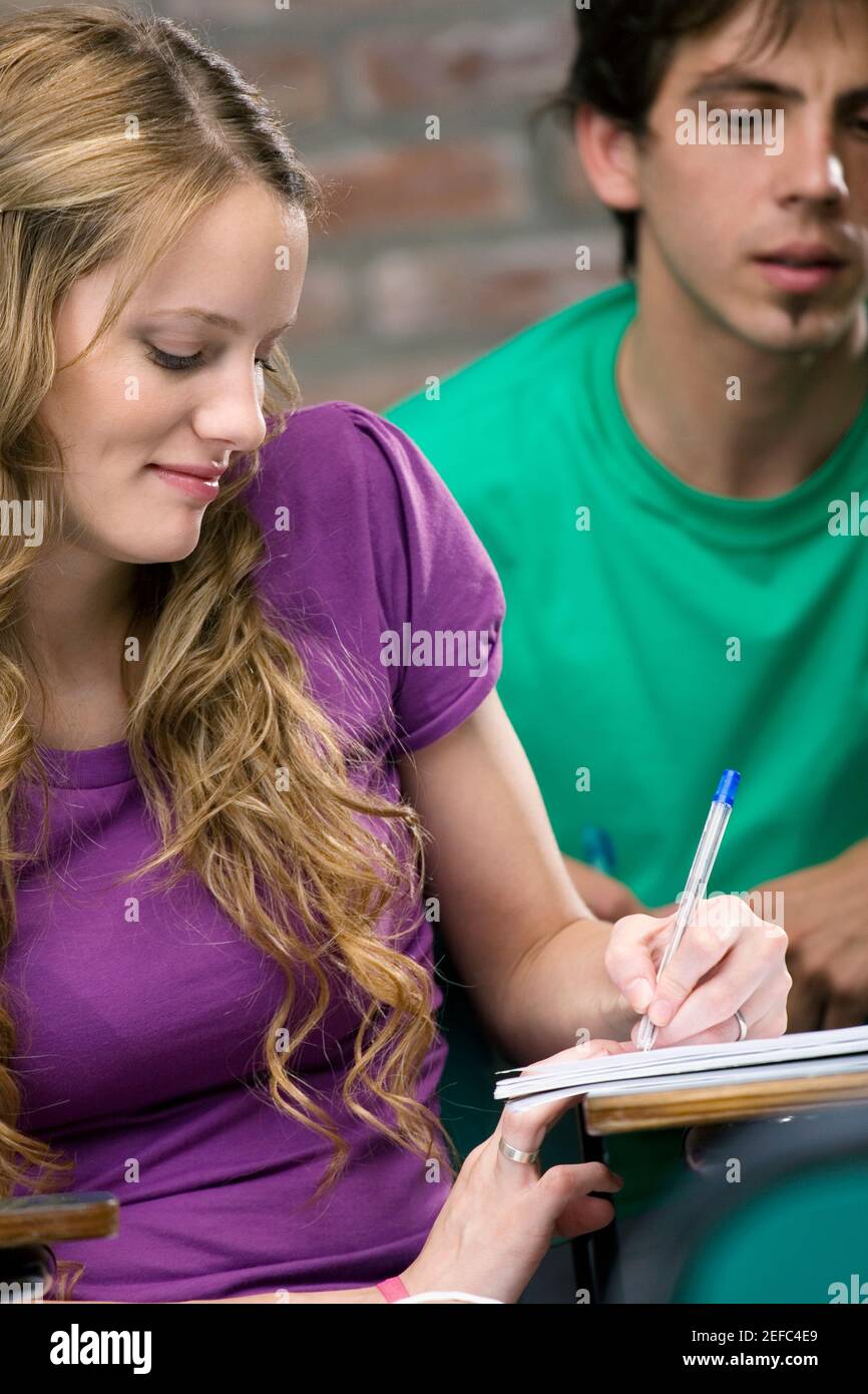 Two university students studying in a classroom Stock Photo - Alamy