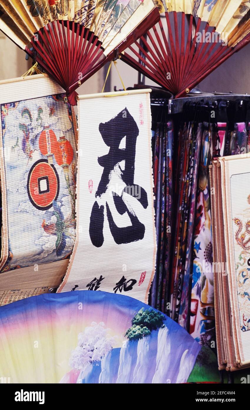 Close-up of banners and folding fans, Singapore Stock Photo - Alamy