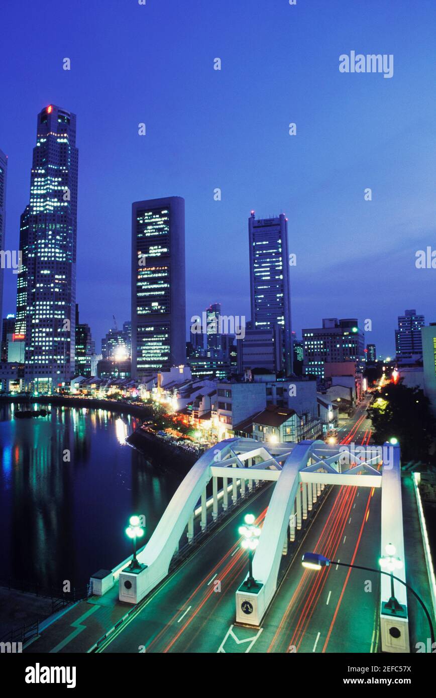Buildings lit up at night, Singapore Stock Photo - Alamy
