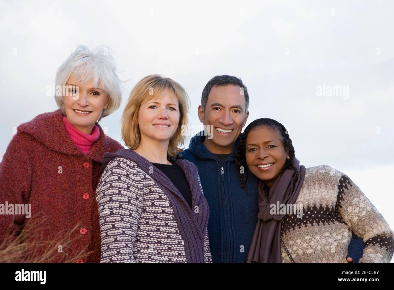 Portrait of four friends smiling Stock Photo - Alamy
