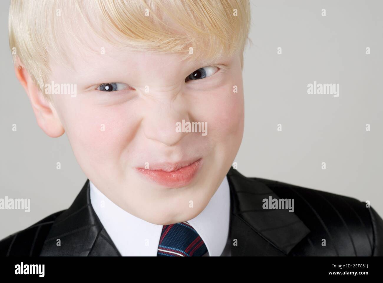 Boy Smirking High Resolution Stock Photography and Images - Alamy