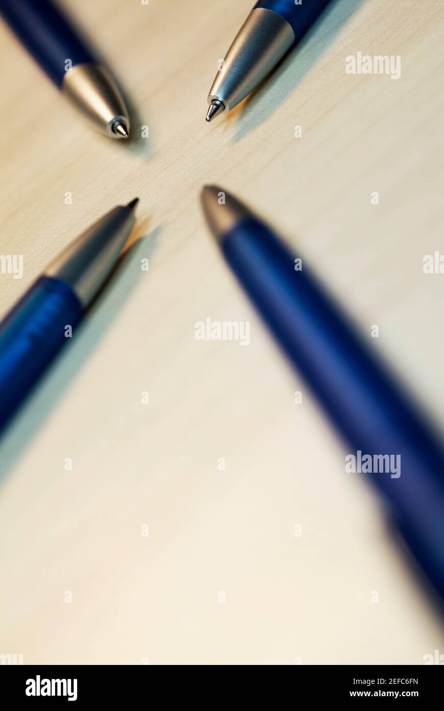 Close-up of four ballpoint pens Stock Photo - Alamy