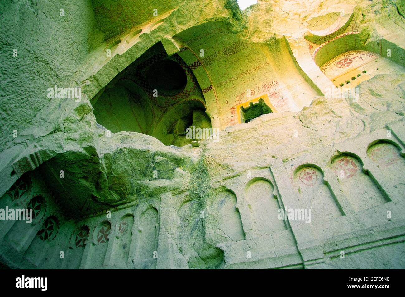 Low angle view of the old ruins of a cave church, Zelve Valley ...