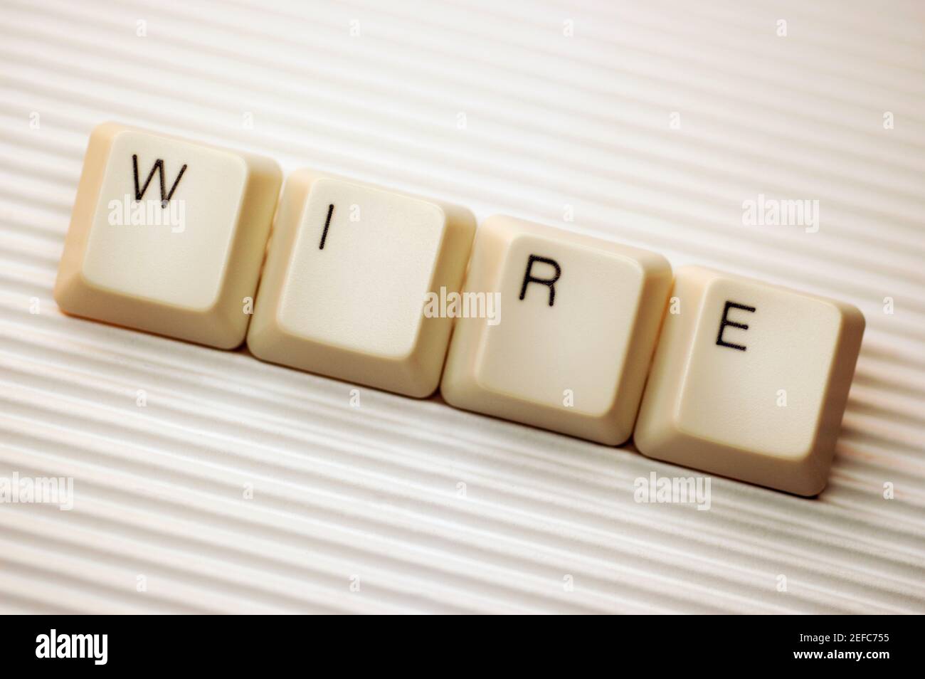 Close-up of computer keys spelling the word wire Stock Photo - Alamy