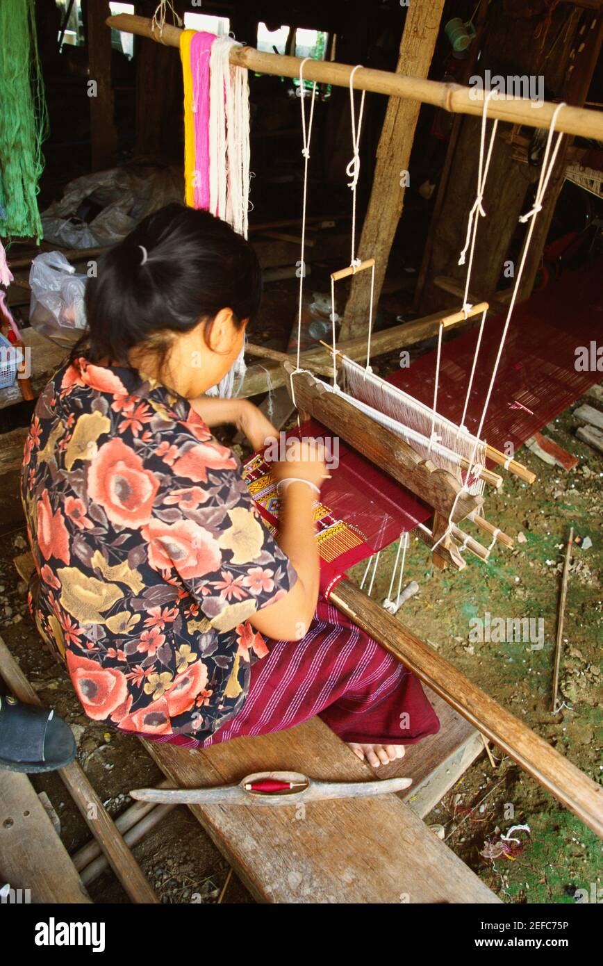 Young woman working on loom hi-res stock photography and images - Alamy