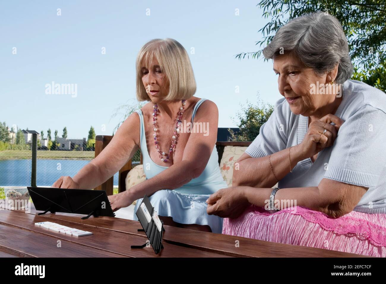 Two elderly women playing game hi-res stock photography and images - Alamy