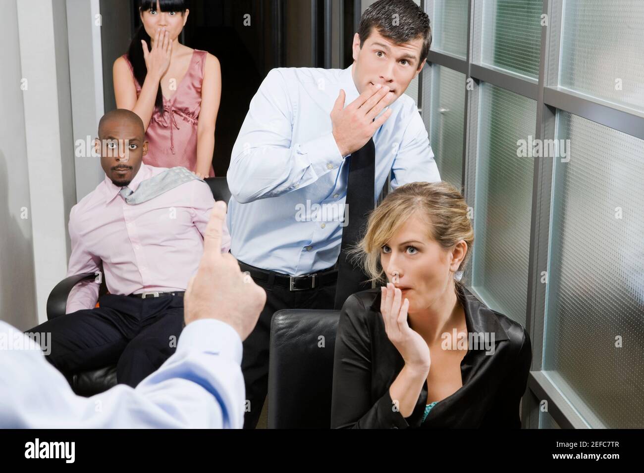 Office workers being scolded by their boss Stock Photo - Alamy