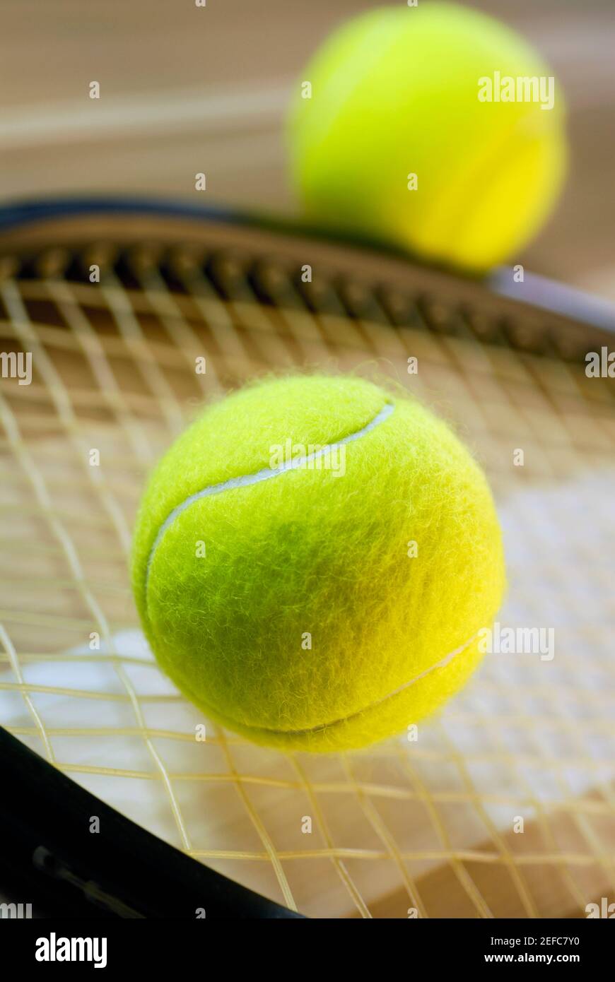 Still life of tennis balls and a racket hi-res stock photography and ...