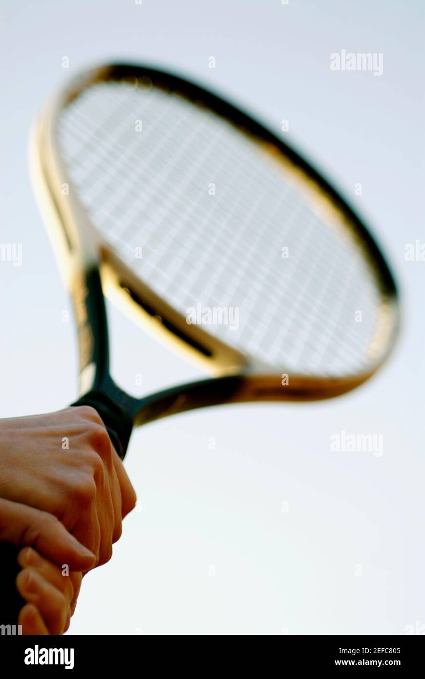 Hand holding tennis racket hi-res stock photography and images - Alamy