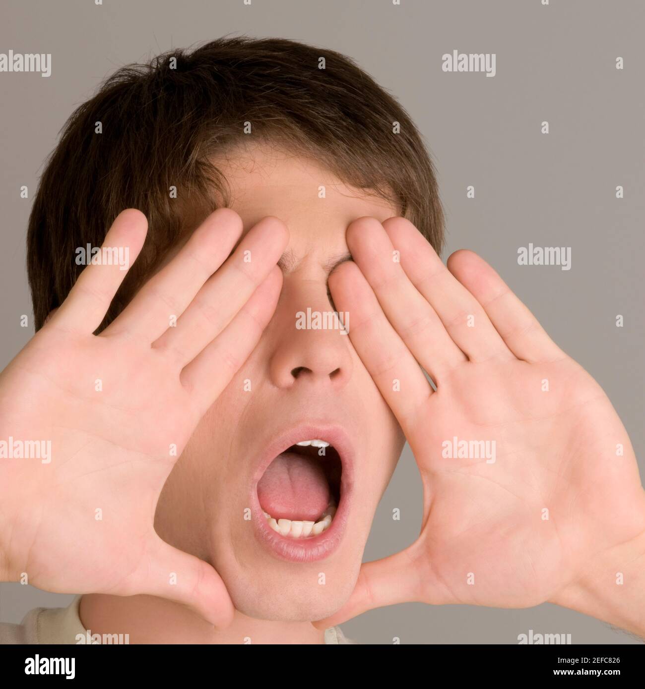 Finger to nose eyes closed hi-res stock photography and images - Alamy