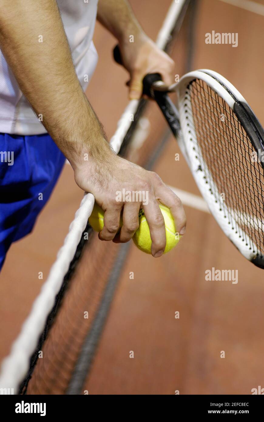 Man holding tennis balls hi-res stock photography and images - Alamy