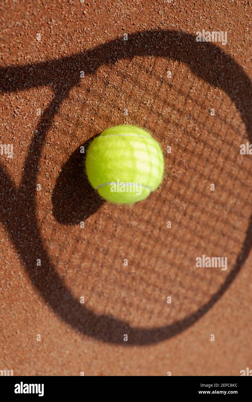 High angle view of a tennis ball on the shadow of a tennis racket Stock ...