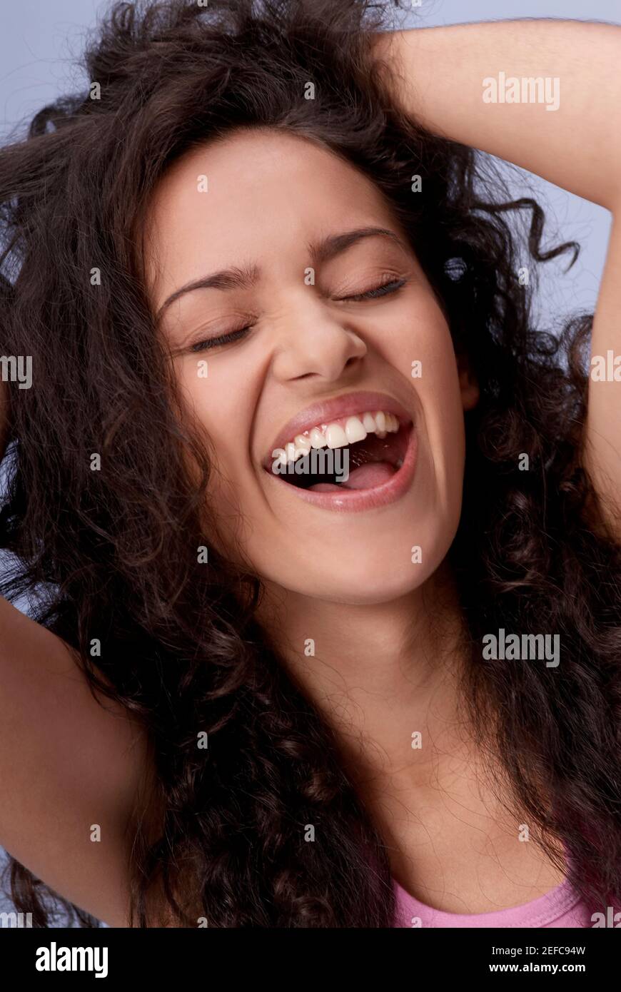 Laughing hispanic female student hi-res stock photography and images ...