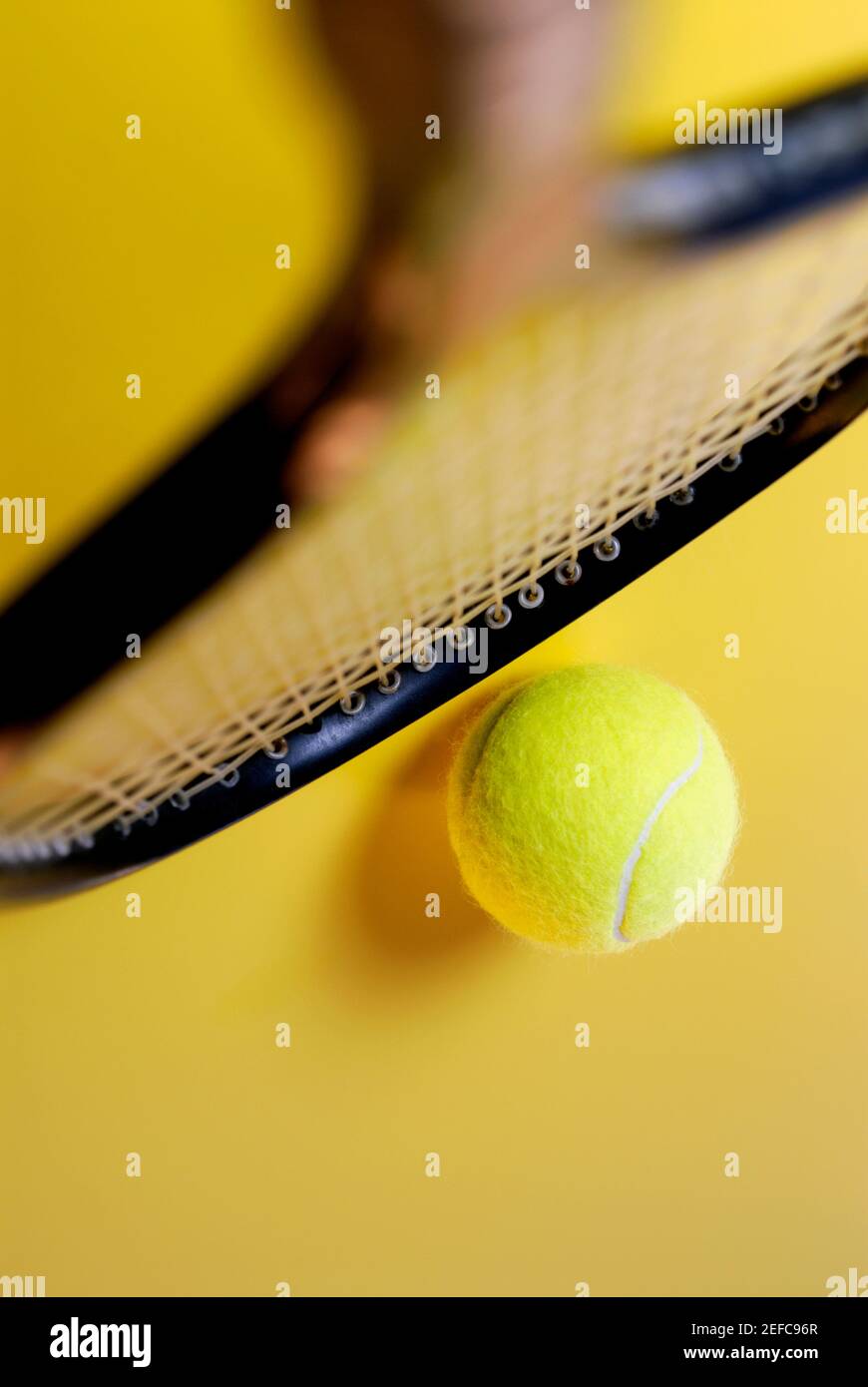High angle view of a tennis racket and a tennis ball Stock Photo - Alamy
