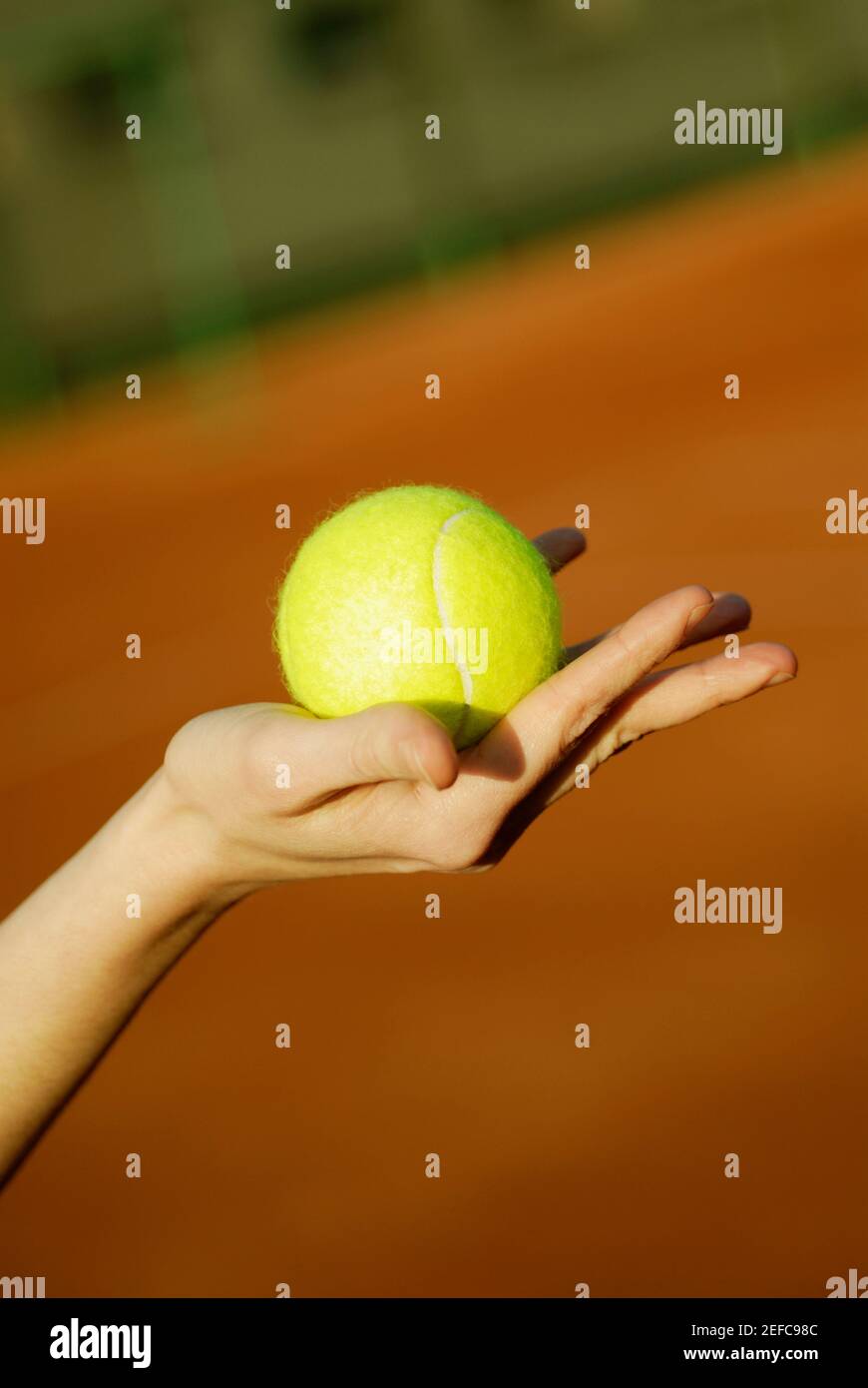 Hand Holding Tennis Ball High Resolution Stock Photography and Images ...