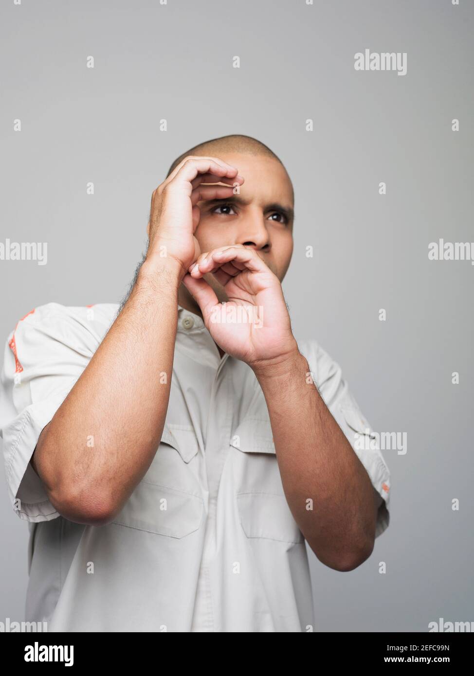 Close up of a young man in fear Stock Photo - Alamy
