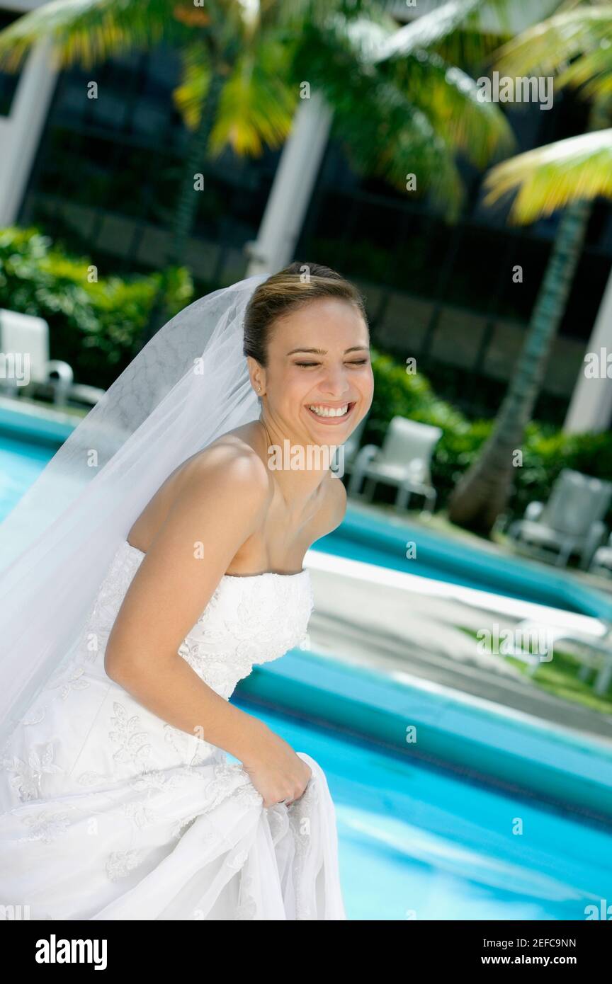 Side profile of a bride smiling Stock Photo - Alamy