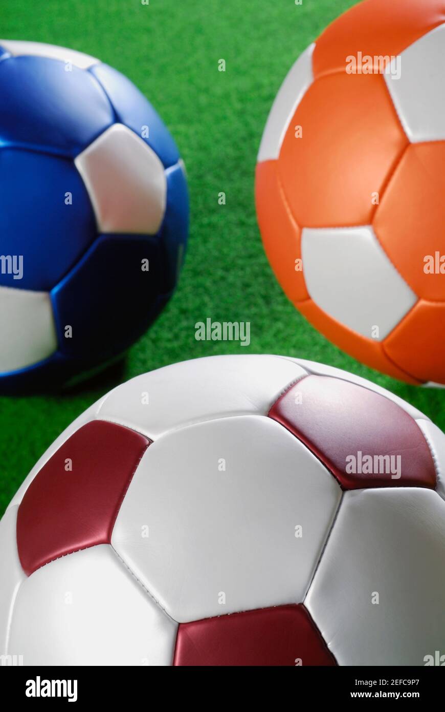 Close-up of three soccer balls Stock Photo - Alamy
