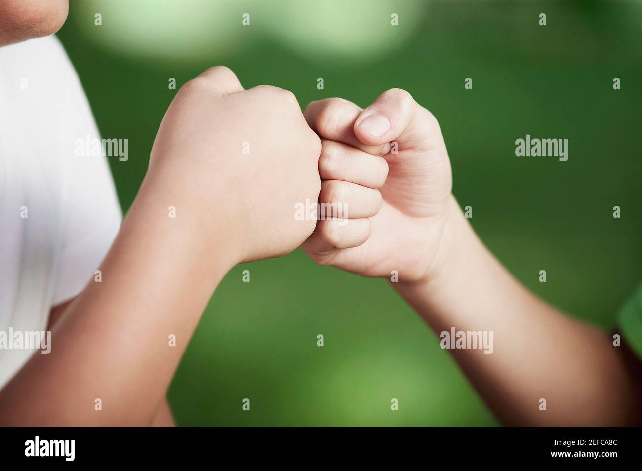 Two people touching close up hi-res stock photography and images - Alamy