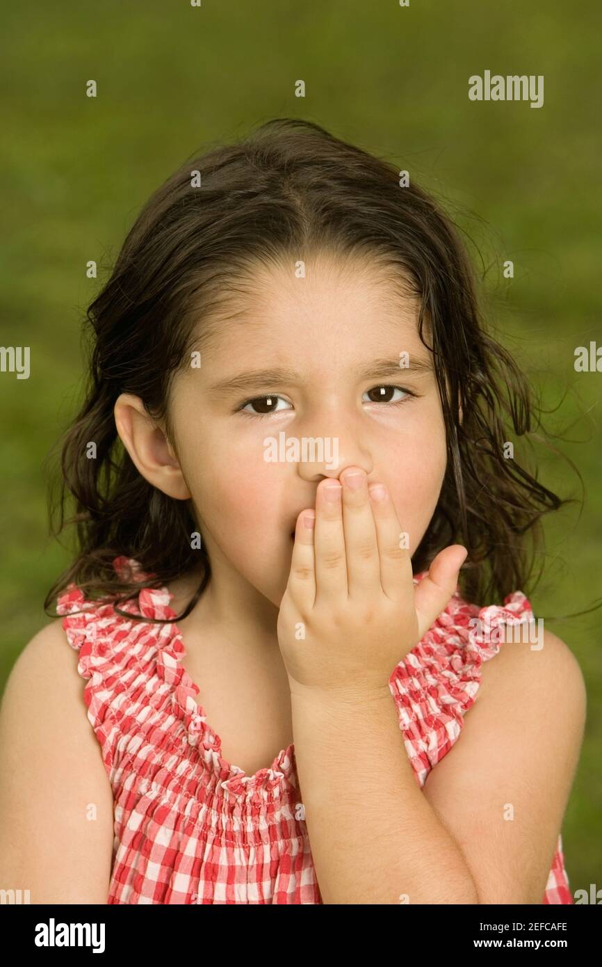 Child hand over mouth hi-res stock photography and images - Alamy