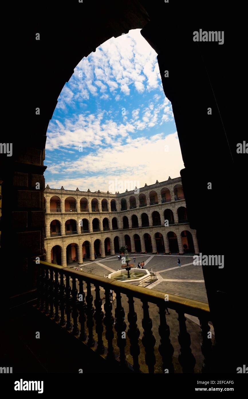 Government building viewed through an arch, National Palace, Zocalo ...