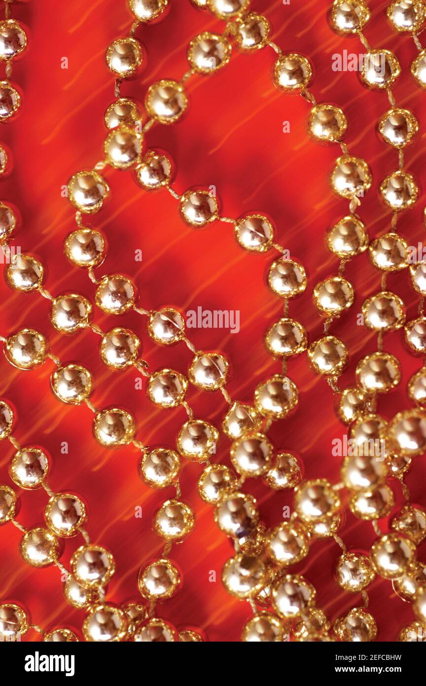 Strings of red beads hi-res stock photography and images - Alamy